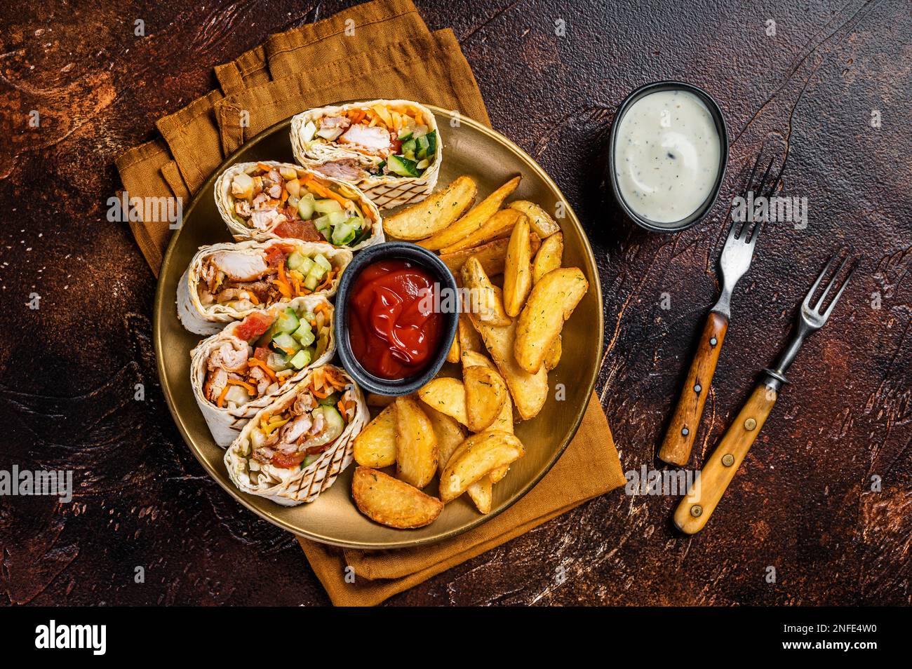 Chicken shawarma durum doner kebab with vegetable salad and french ...