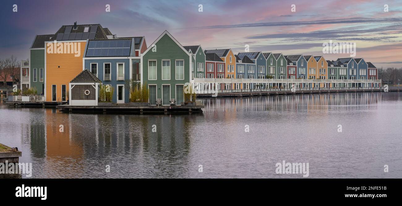 Panorama of famous colorful wooden houses by the Rietplas lake in ...