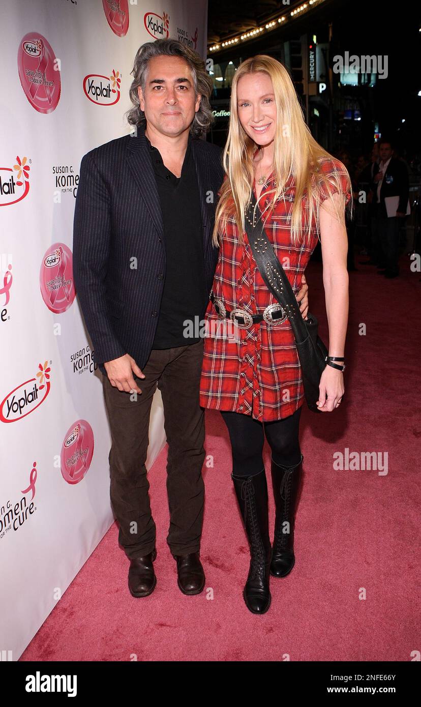 Actress Kelly Lynch and guest attend the Sheryl Crow performance at the ...