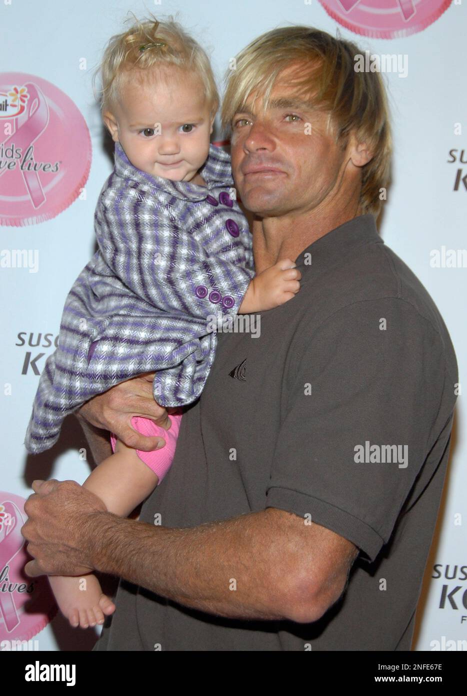 Surfer Laird Hamilton, right, and son Brody Hamilton pose on the press ...