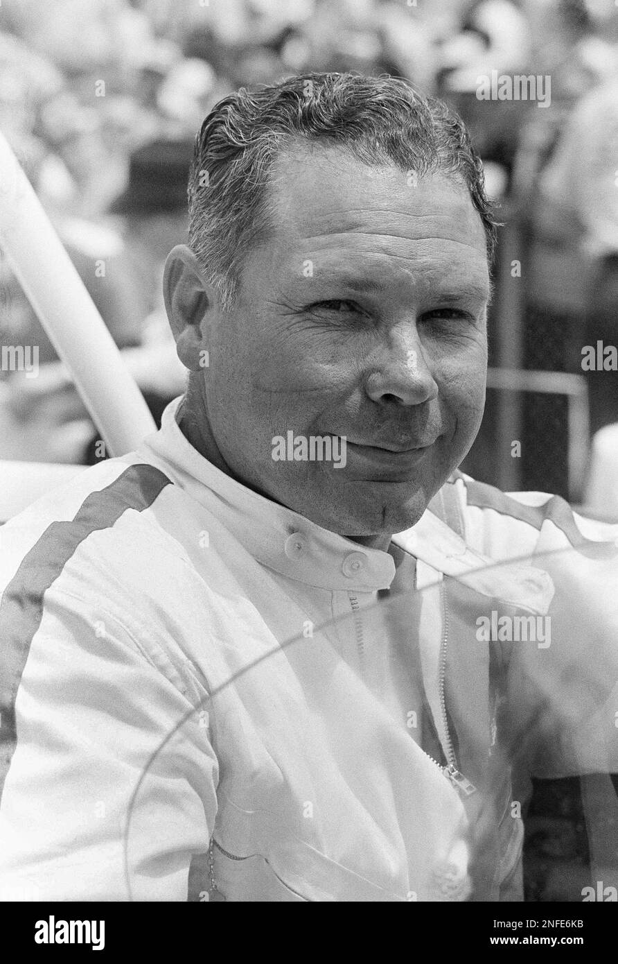 Race car driver Lloyd Ruby qualified for 1964 500 at a speed of 153.932 ...