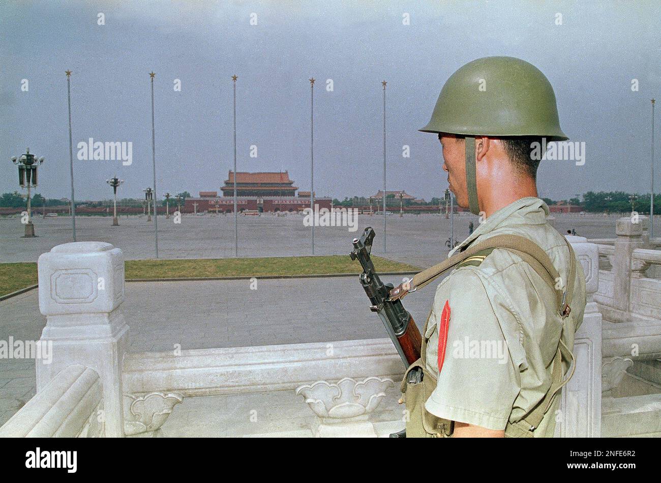 A Peoples Liberation Army soldier guards a very empty Tiananmen Square ...