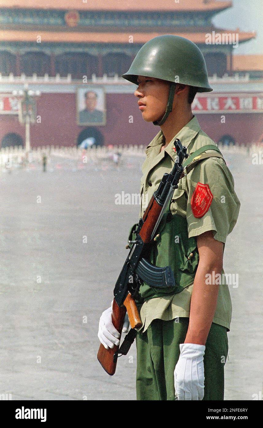 A People's Liberation Army soldier guards a very empty Tiananmen Square ...
