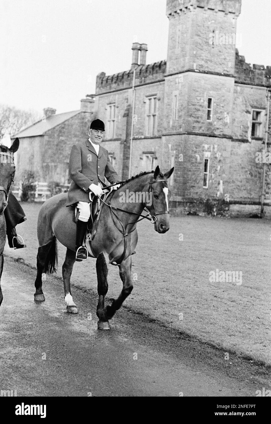 Director John Huston rides from Tilara Castle, the home of Lord ...