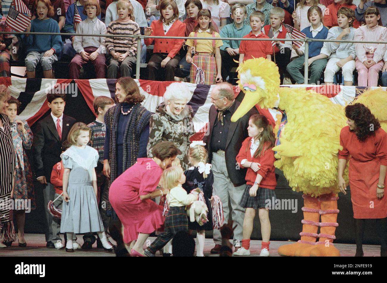 First lady Barbara Bush stands behind children, Big Bird and actor ...