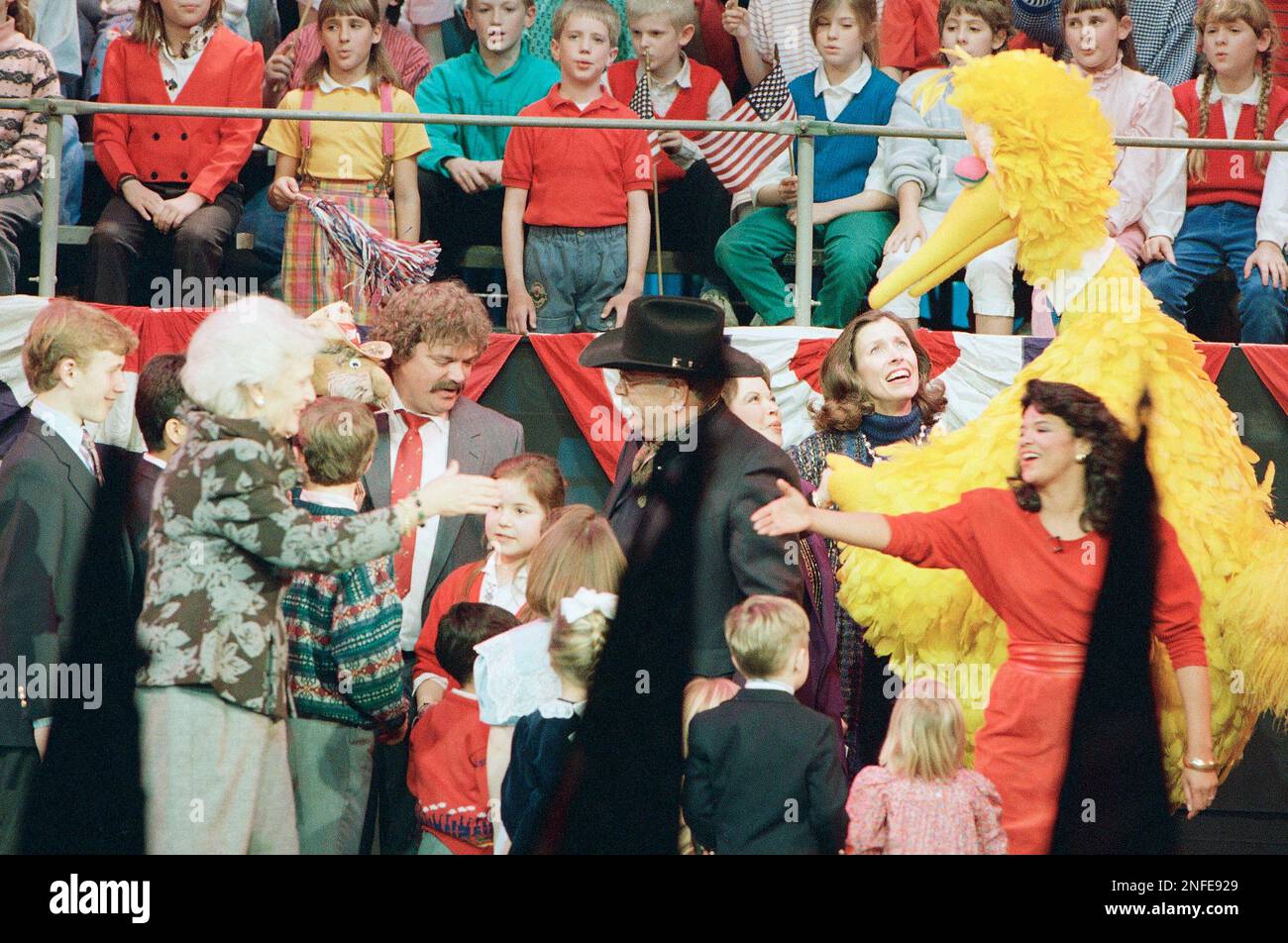 First lady Barbara Bush stands behind children, Big Bird and actor ...