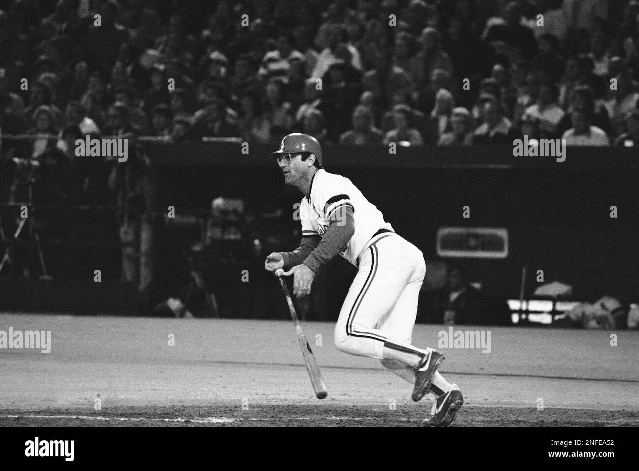 St. Louis Cardinals batter Darrell Porter drops his bat and heads for ...