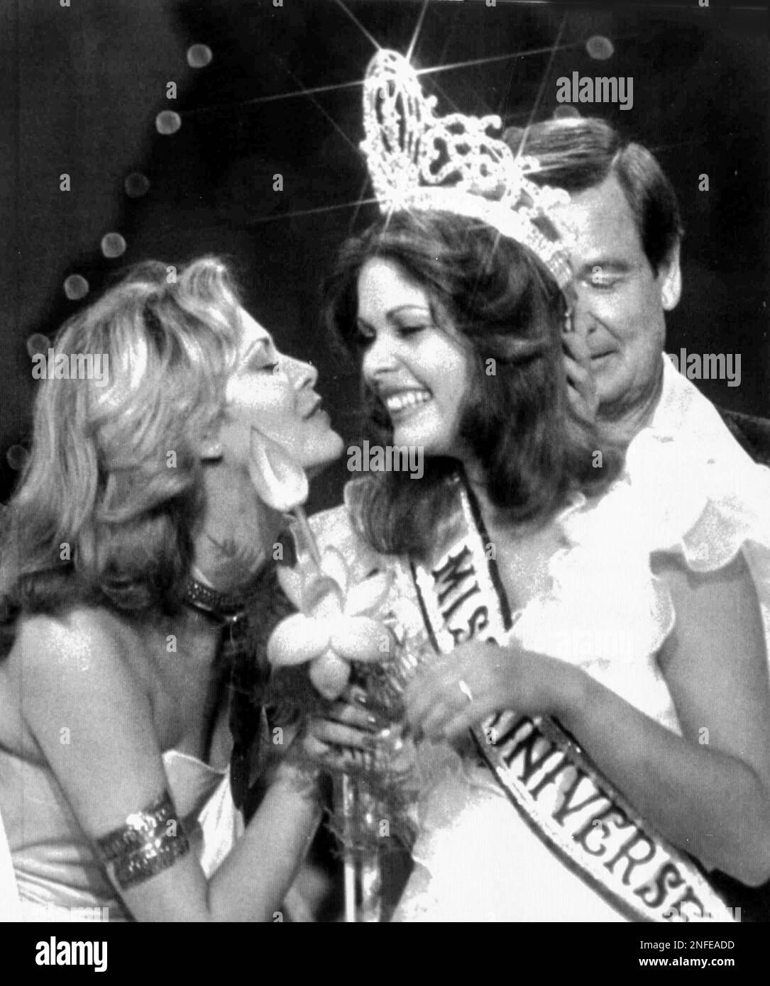 The new Miss Universe, Rina Messinger of Israel, right, receives the ...