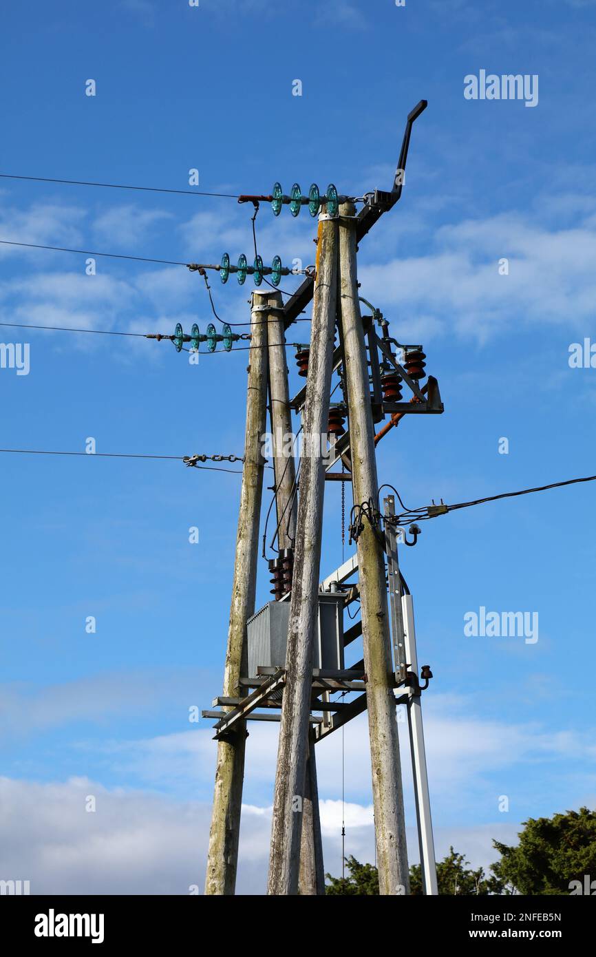 Electric grid in Norway. Wooden electric pole with glass insulators ...