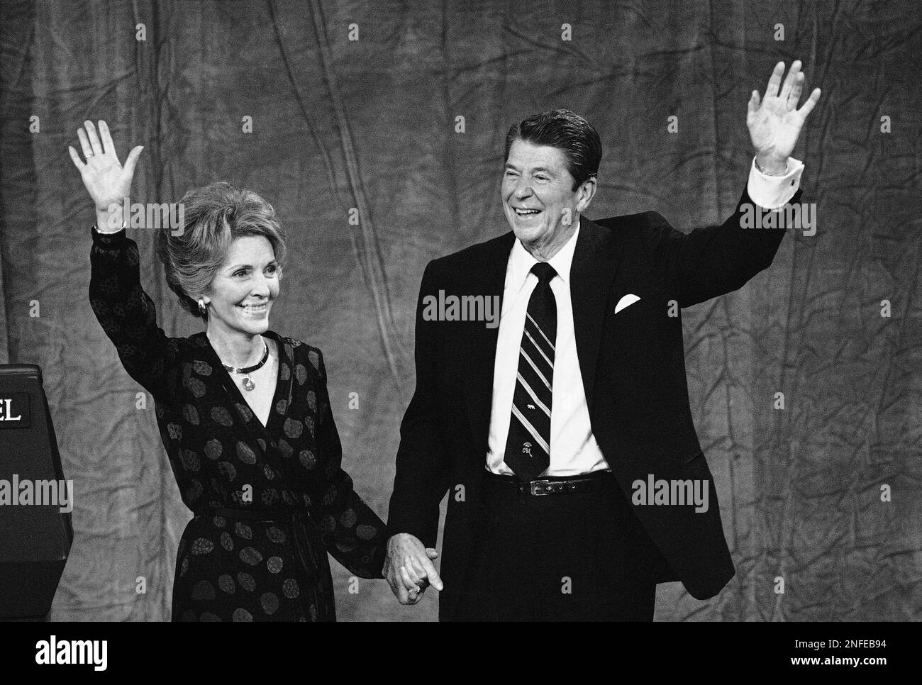 President-elect Ronald Reagan and wife Nancy wave to well-wishers, Nov ...