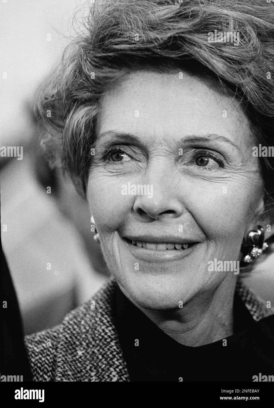 Nancy Reagan smiles as she and President Reagan arrived in Palm Springs ...