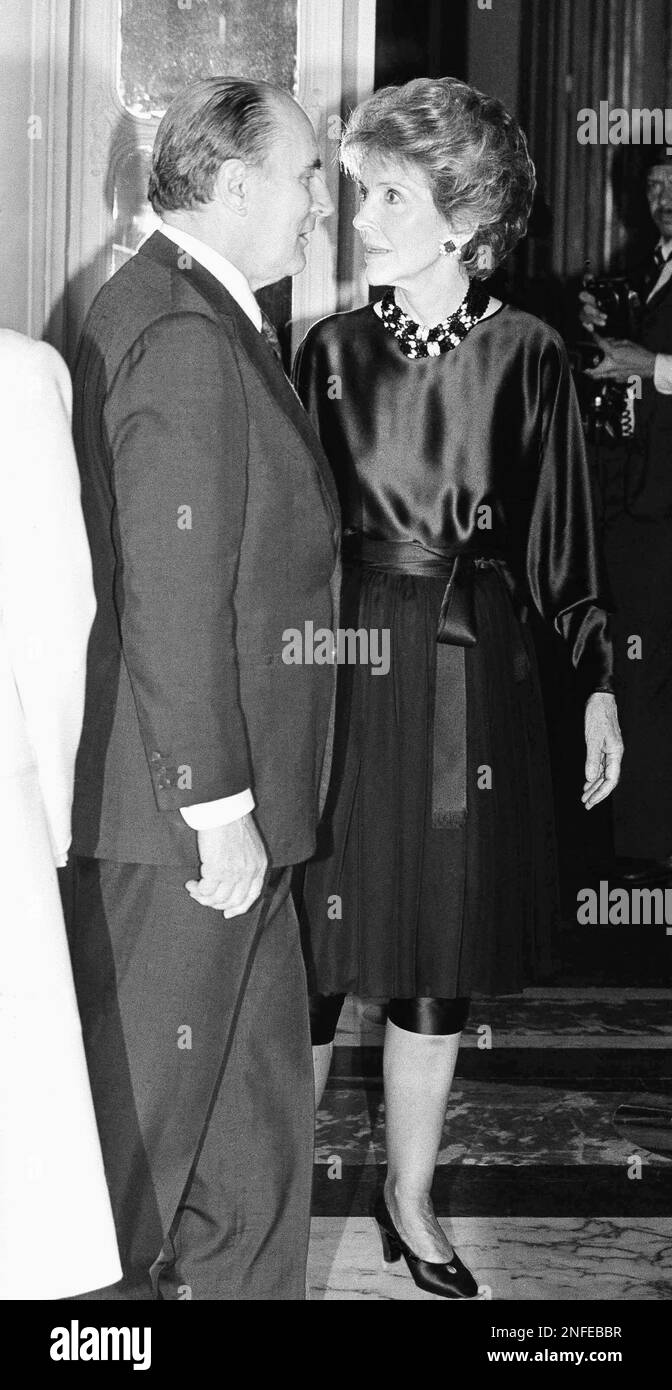 First lady Nancy Reagan, wearing a pants outfit designed by Galanos ...