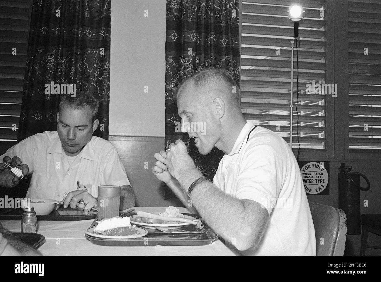 Col John Glenn eats lunch at Grand Turk Island on Feb. 20, 1962 after ...