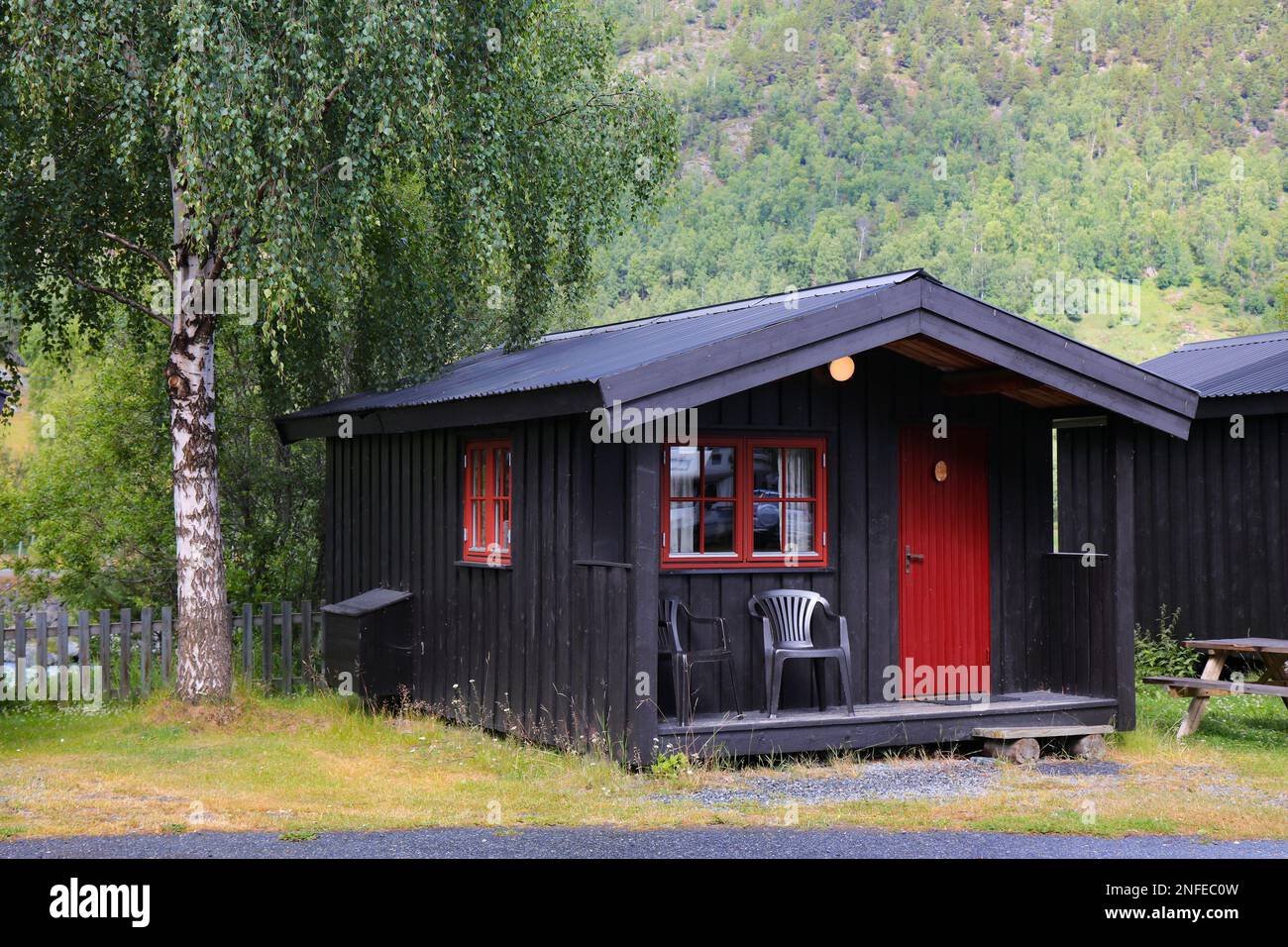 Norway generic camping cottage (hytte). Wooden cabin at a campsite in ...