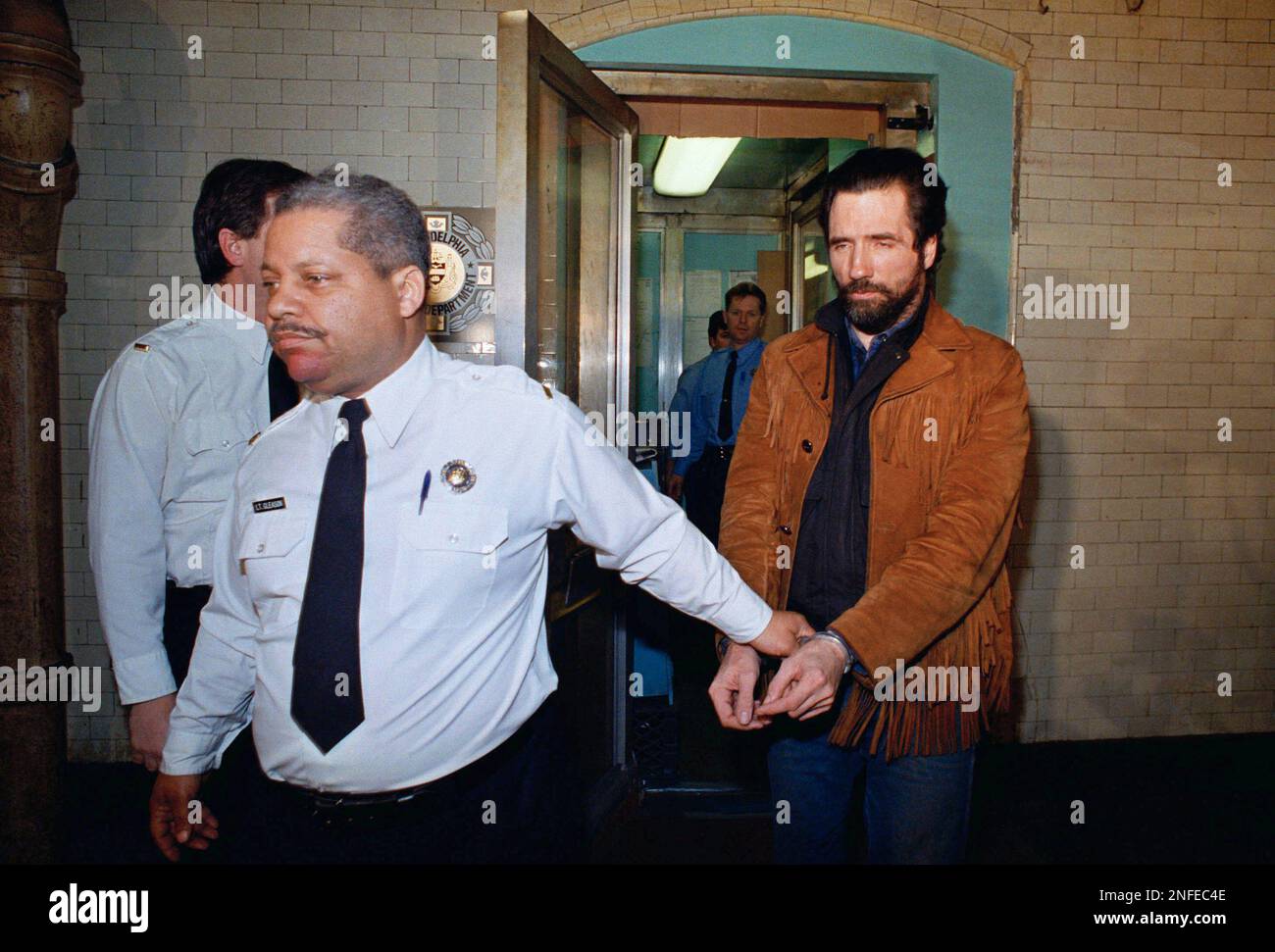 Gary Heidnik is led to court at Philadelphia City Hall April 1, 1987 in ...