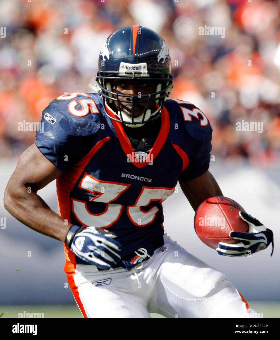 Denver Broncos running back Selvin Young carries against the Tampa Bay ...