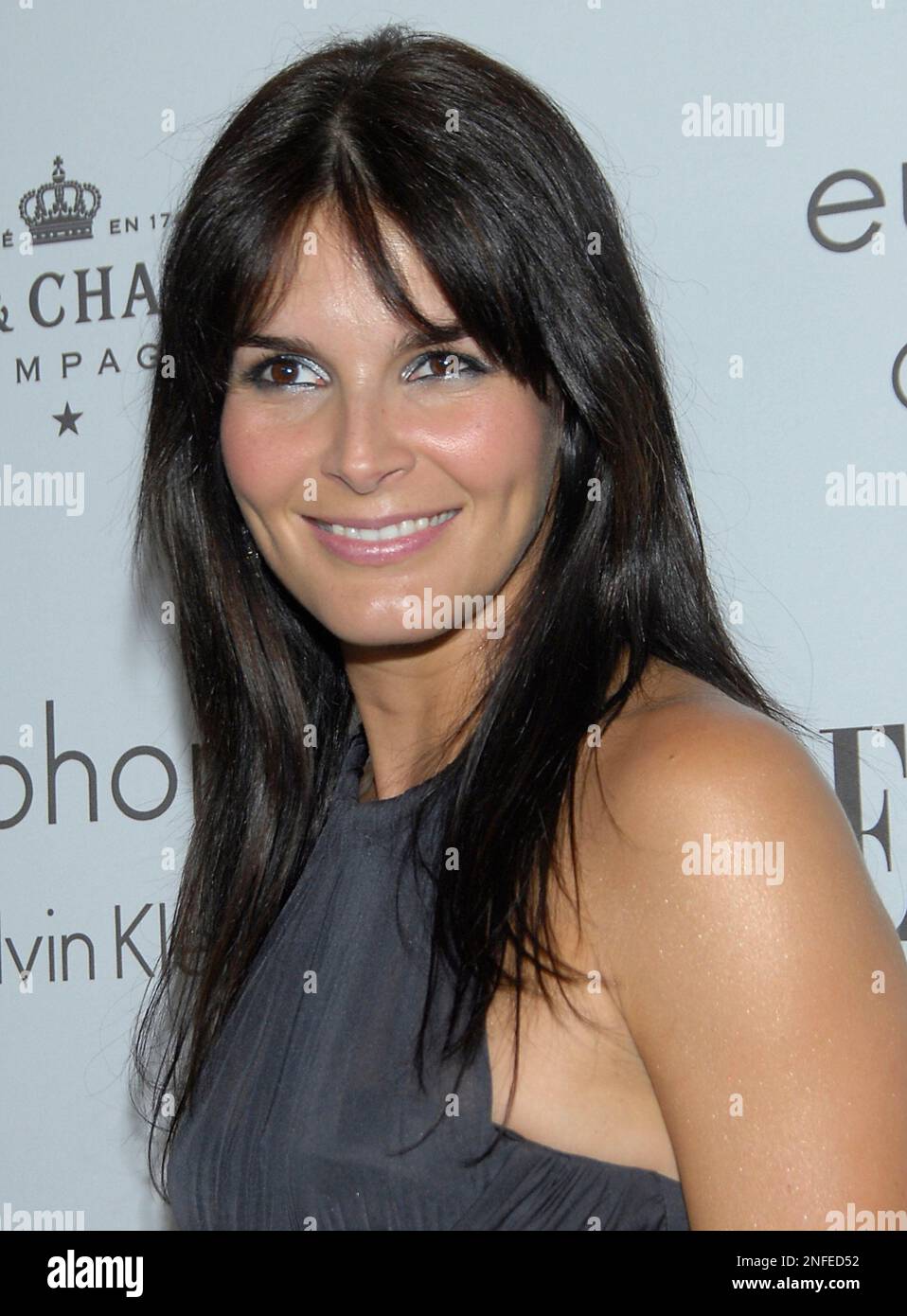 Actress Angie Harmon poses on the press line at Elle Magazine's 15th ...