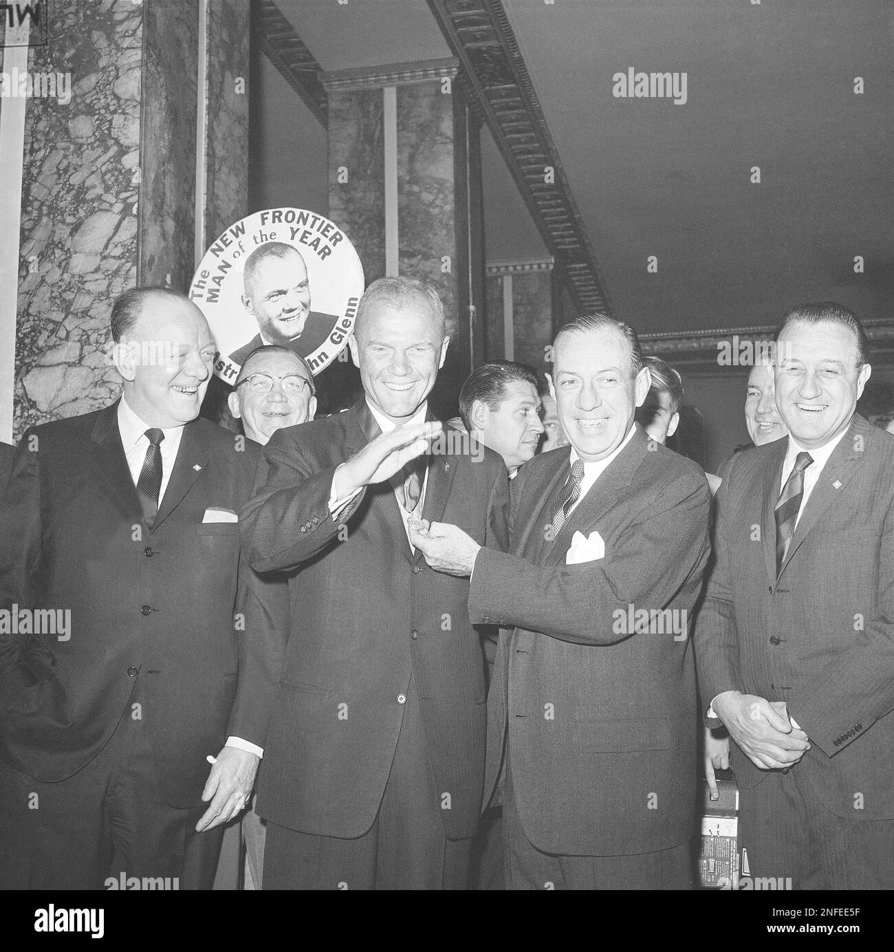 Col. John H. Glenn Jr., beams as Mayor Robert Wagner fingers New York's ...