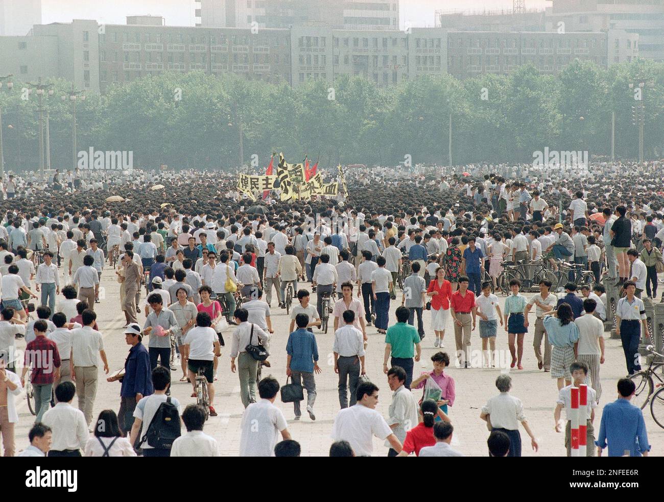 Up to 60,000 people hold a memorial service at People's Square, in ...