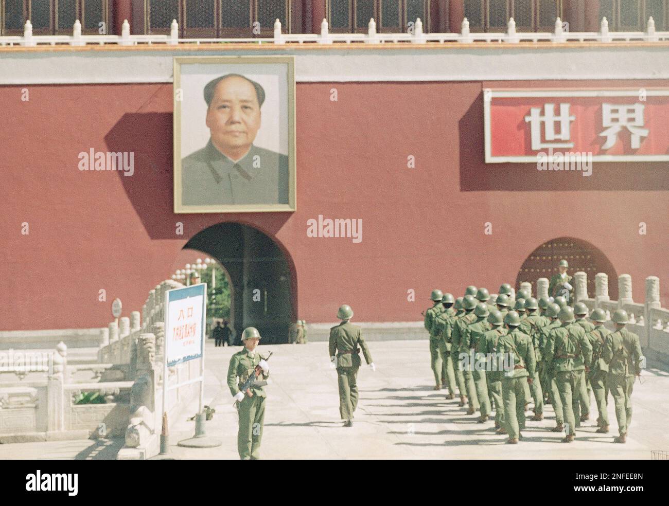 Chinese troops march in formation into the Forbidden City in Beijing ...