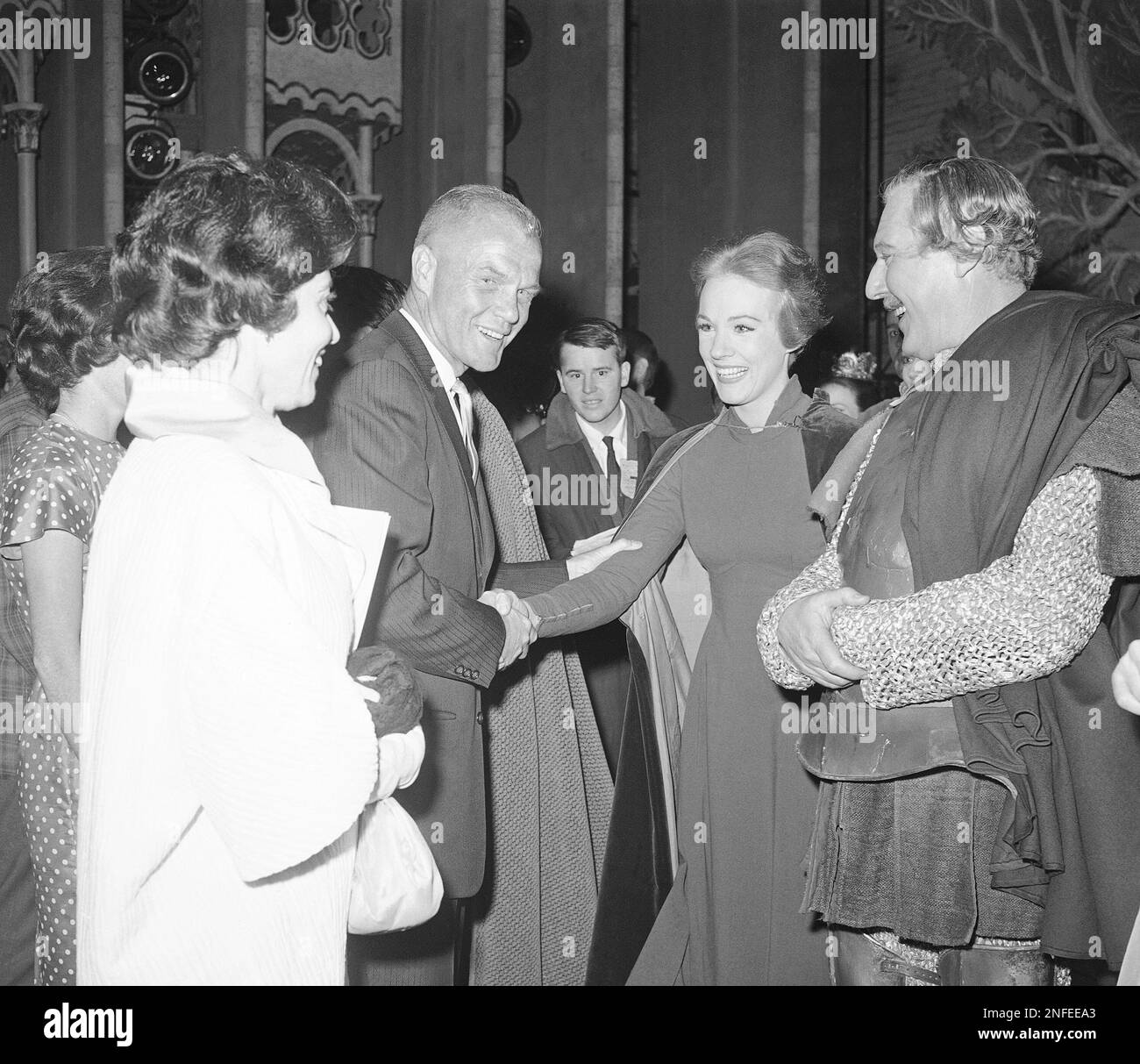 Astronaut. John Glenn and his wife Annie shake hands with Julie Andrews ...