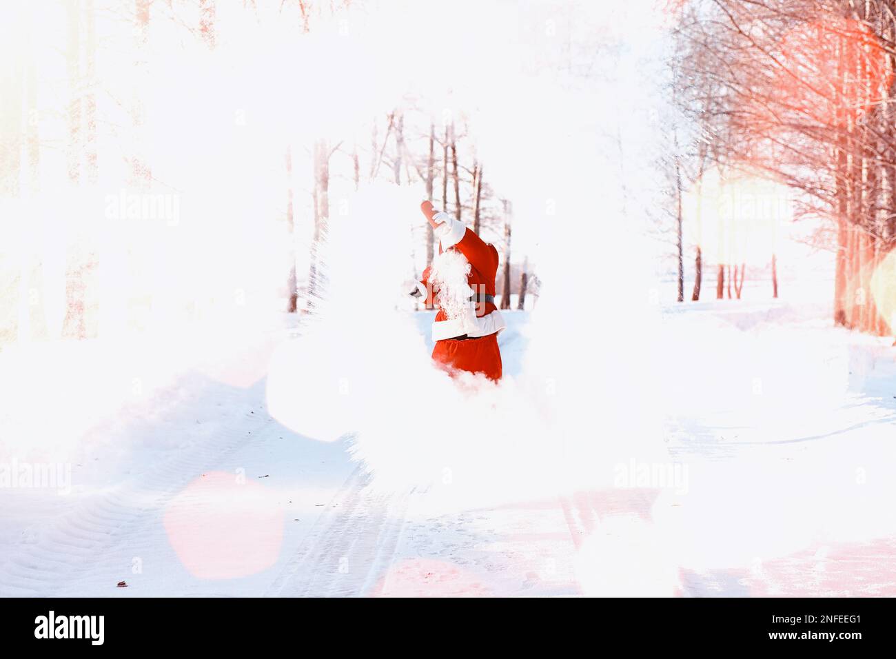 Santa in the winter field. Santa magical fog walking along the field ...
