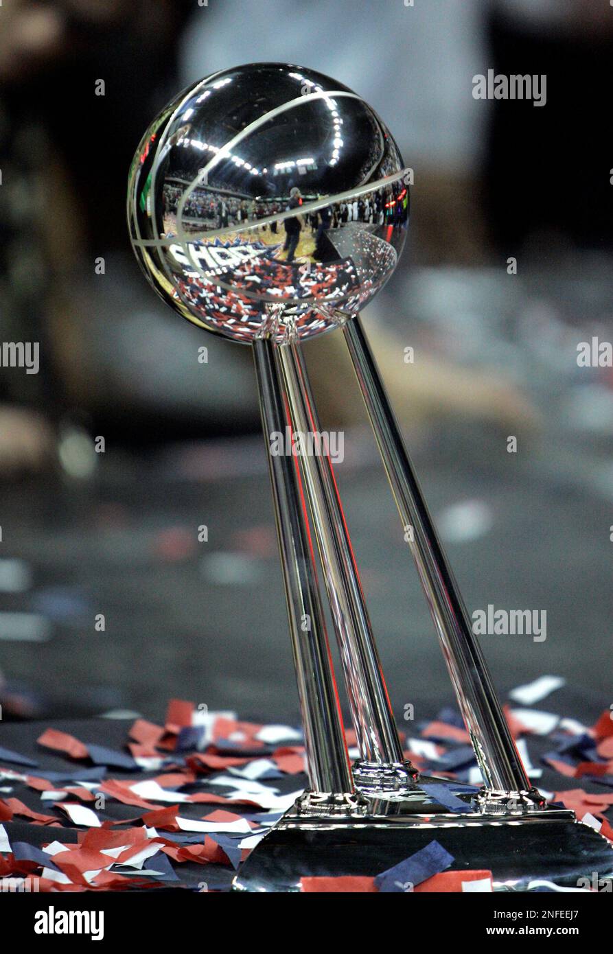 The Detroit Shock logo is reflected in the WNBA Championship trophy ...