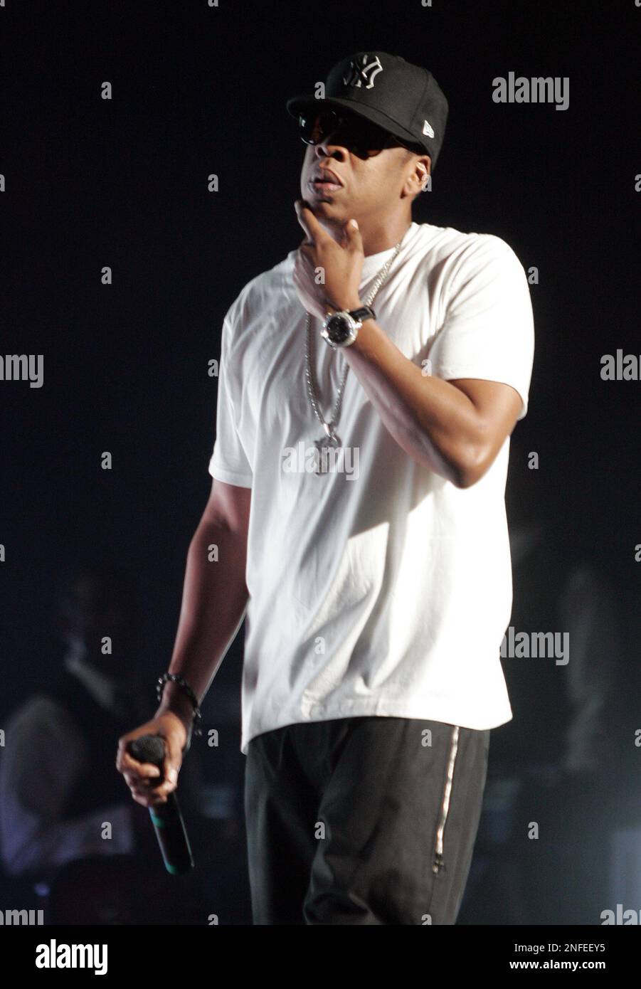 Recording artist Jay-Z, sings for fans at Cobo Arena during an ...