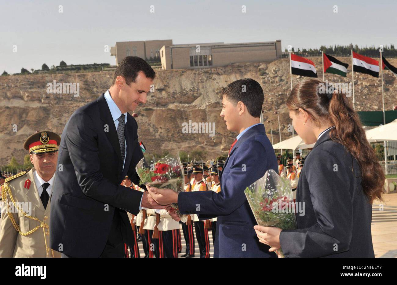 Syrian president Bashar Assad visits the Martyrs Tomb in Damascus on ...