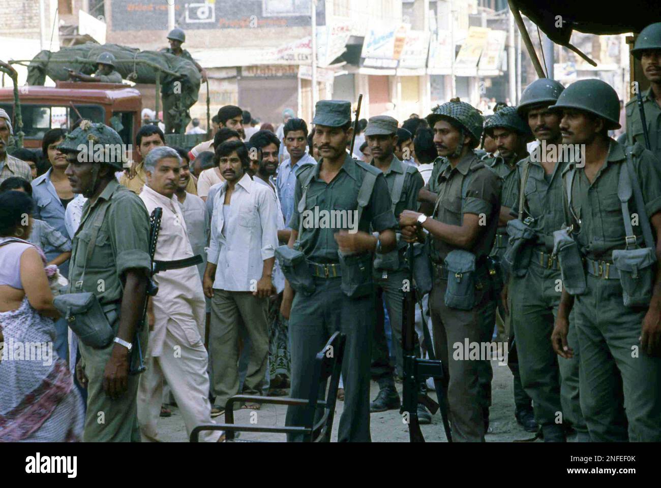 Indian troops take up positions around the Golden Temple, in Amritsar ...