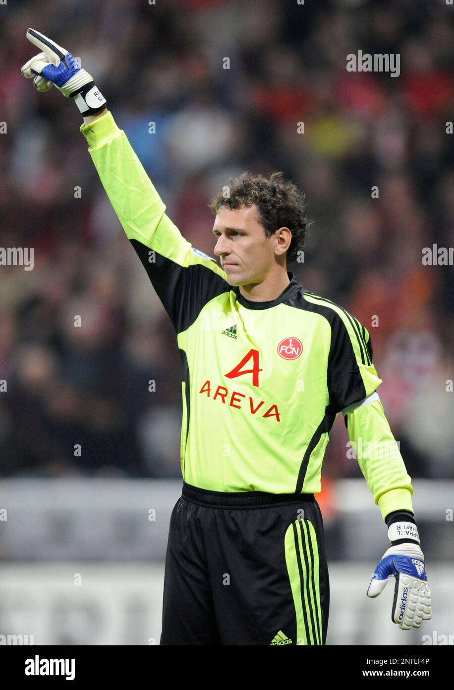 Nuremberg soccer goalkeeper Raphael Schaefer gestures during the German ...