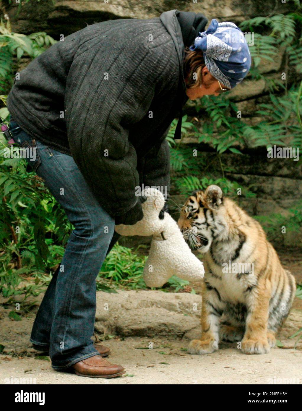 Country Western singer Billy Ray Cyrus plays with his namesake, four ...
