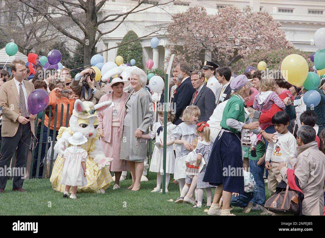 Barbara Bush right, wife of Vice-President George Bush, walks with ...