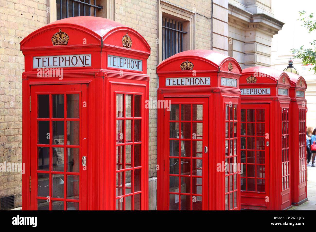 London telephone booth row. London landmarks - red phone booths Stock ...
