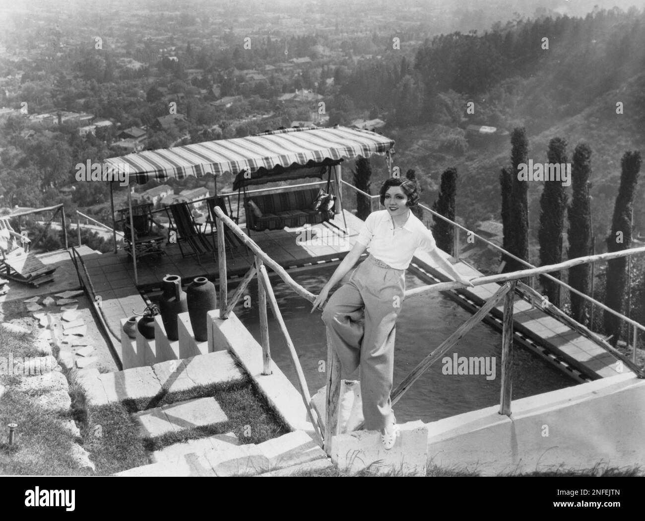 French-U.S.-American actress Claudette Colbert, poses at the pool of ...