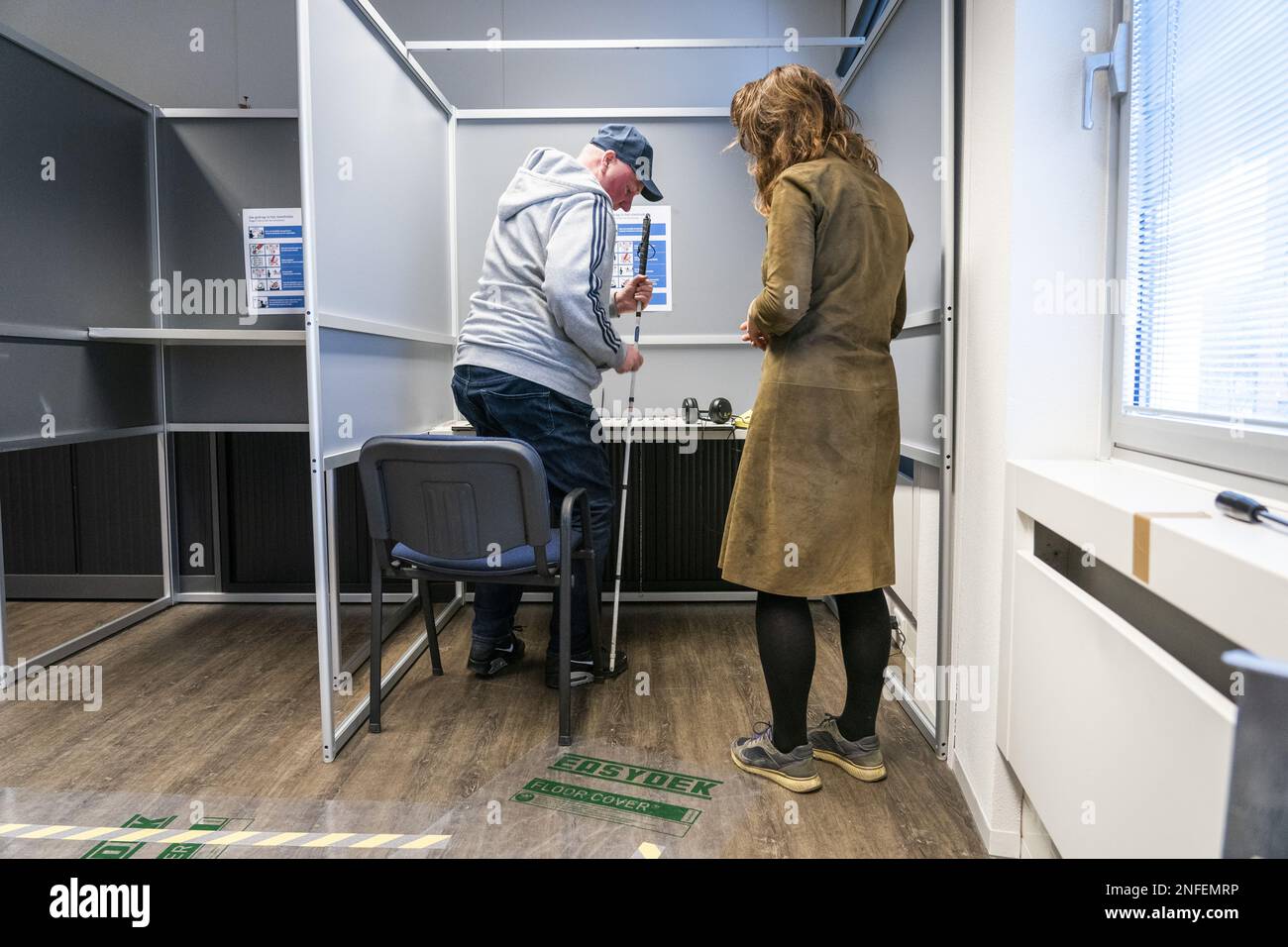 THE HAGUE - A visually impaired person during a practice voting day for ...