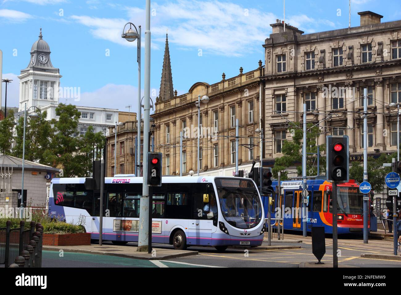 SHEFFIELD, UK - JULY 10, 2016: People ride First city bus and ...