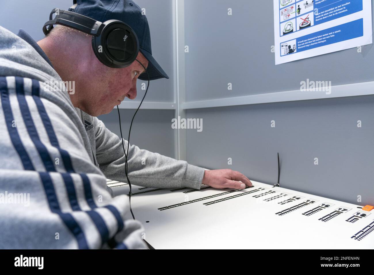 THE HAGUE - A visually impaired person during a practice voting day for ...