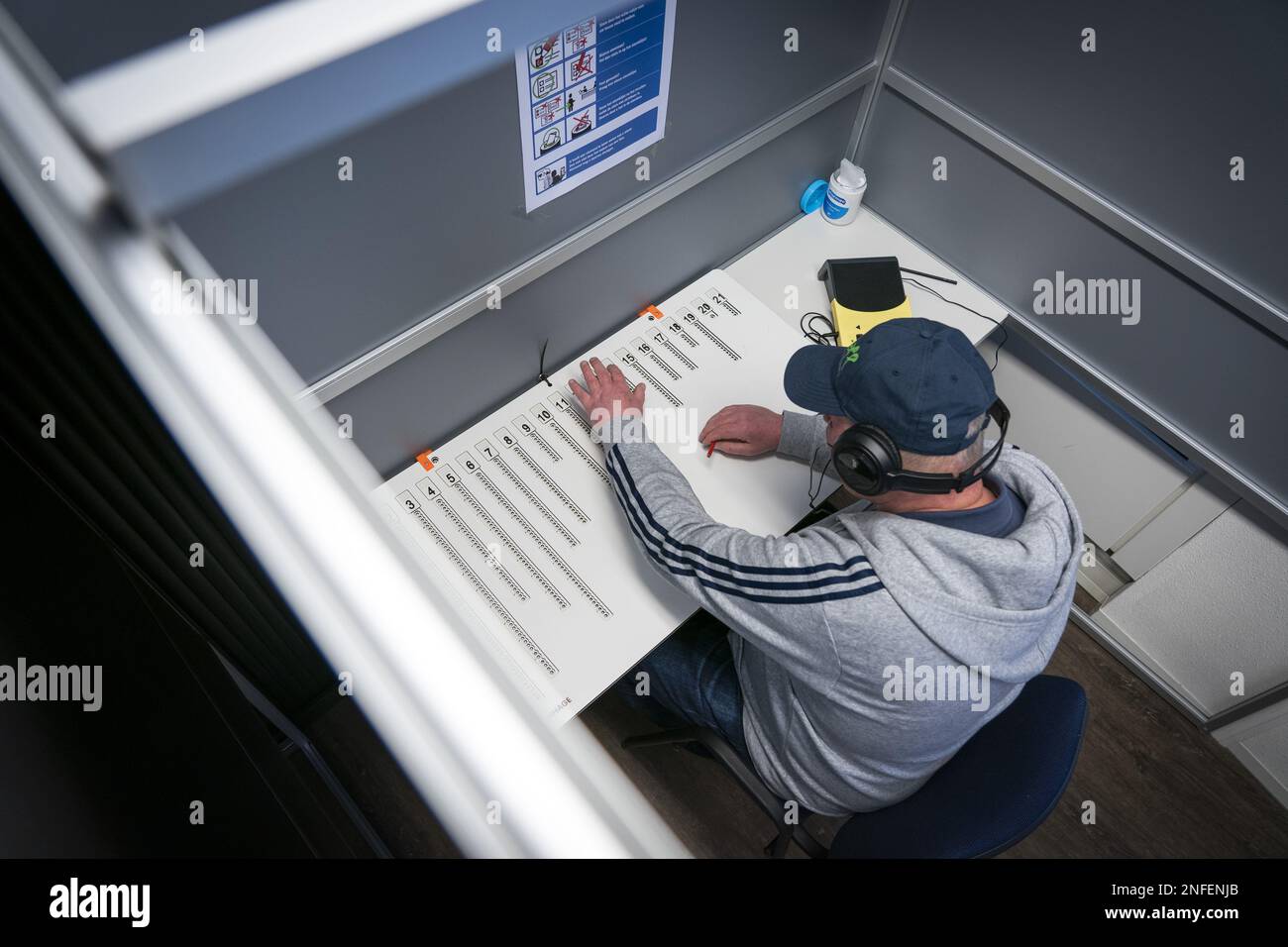 THE HAGUE - A visually impaired person during a practice voting day for ...