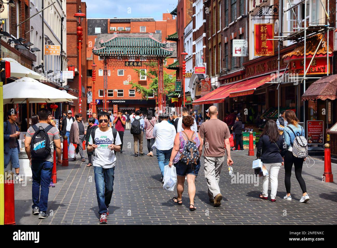 LONDON, UK - JULY 6, 2016: People visit Chinatown district of London ...