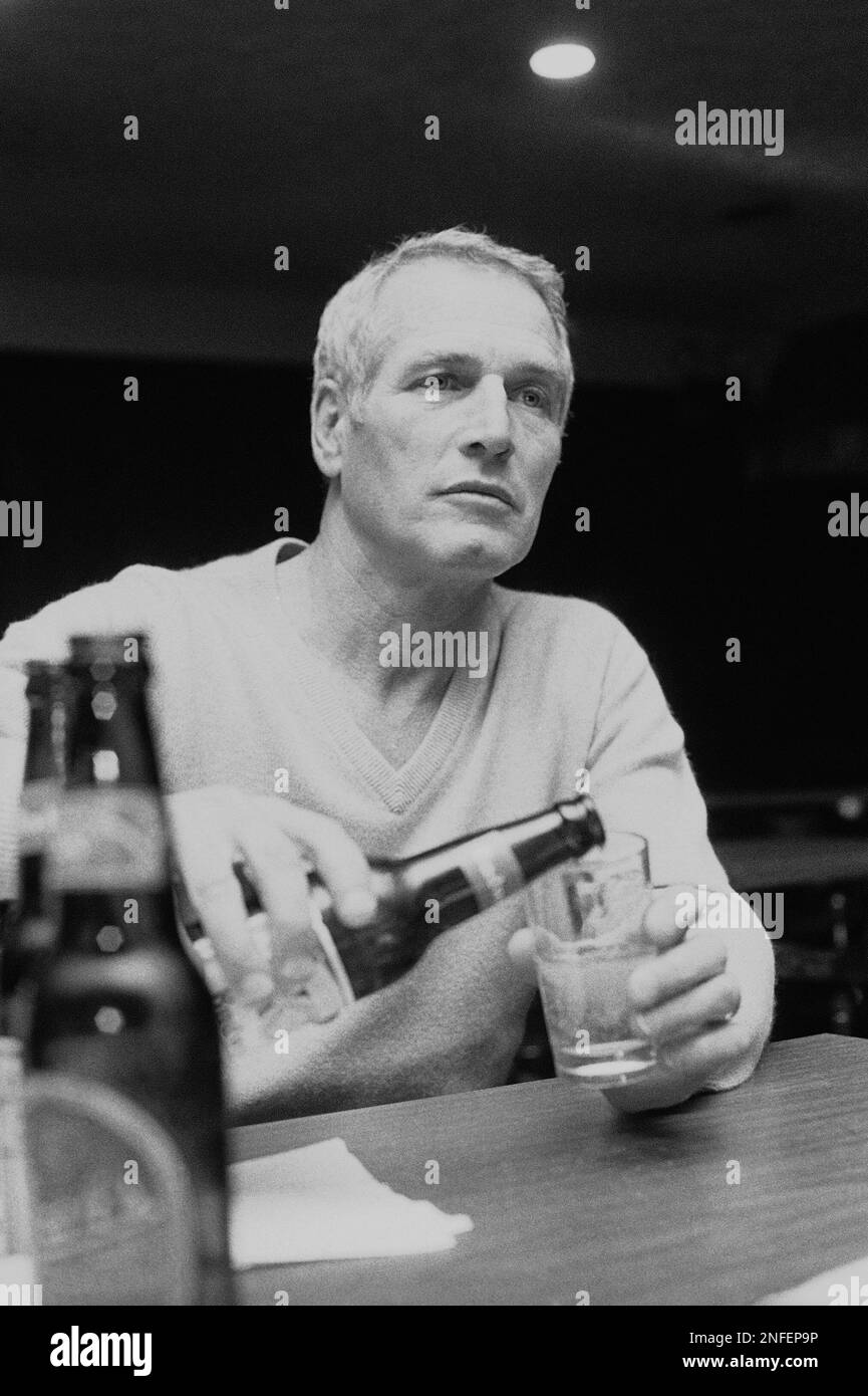 Actor Paul Newman has a beer during an interview at his Alma Mater ...