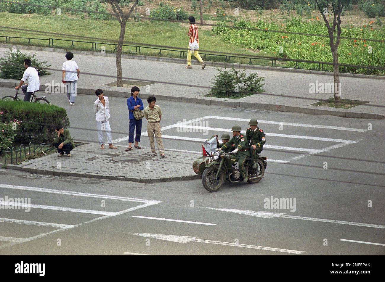 Chinese Peoples Liberation Army troops, patrol main streets Tuesday ...