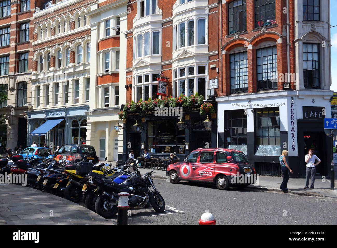 LONDON, UK - JULY 9, 2016: People visit a street in Farringdon Without ...