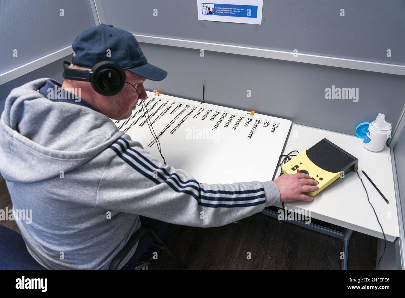 THE HAGUE - A visually impaired person during a practice voting day for ...