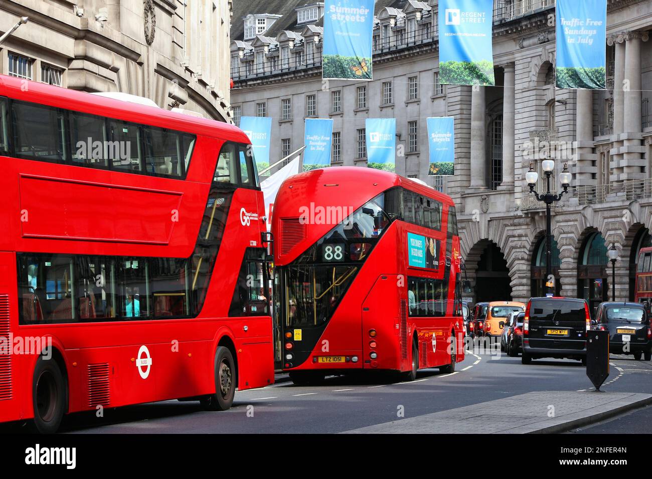 LONDON, UK - JULY 7, 2016: Red double decker buses at Regent Street in ...