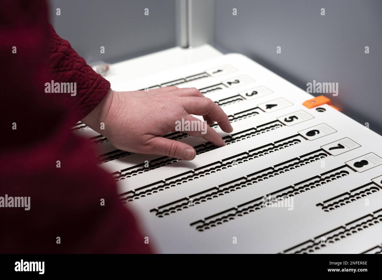 THE HAGUE - A visually impaired person during a practice voting day for ...