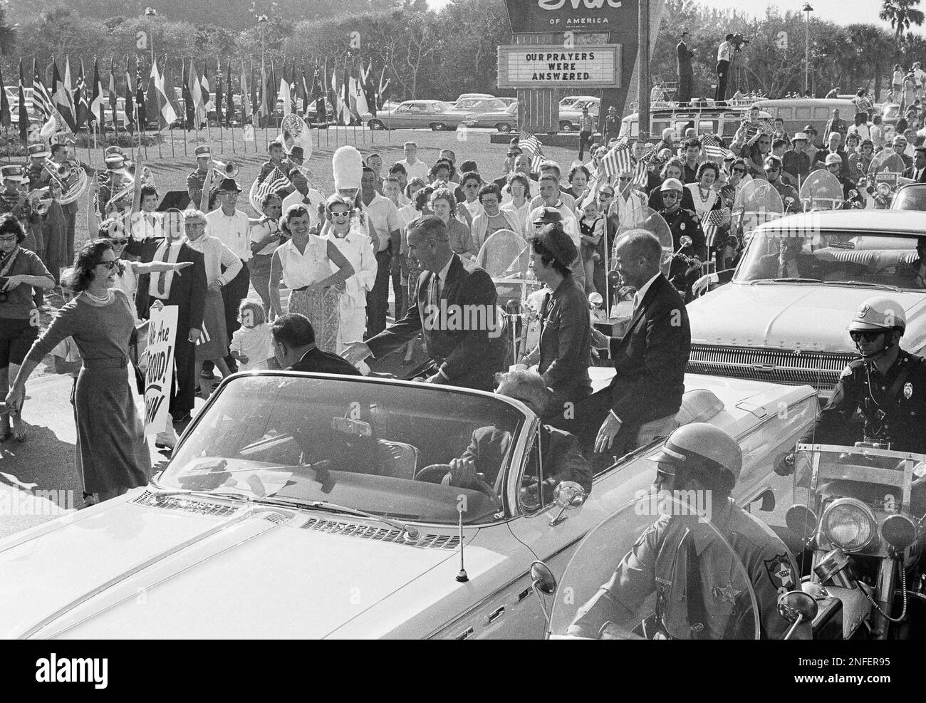 Excited crowds line parade route in Cocoa Beach, Fla., on Feb. 23, 1962 ...