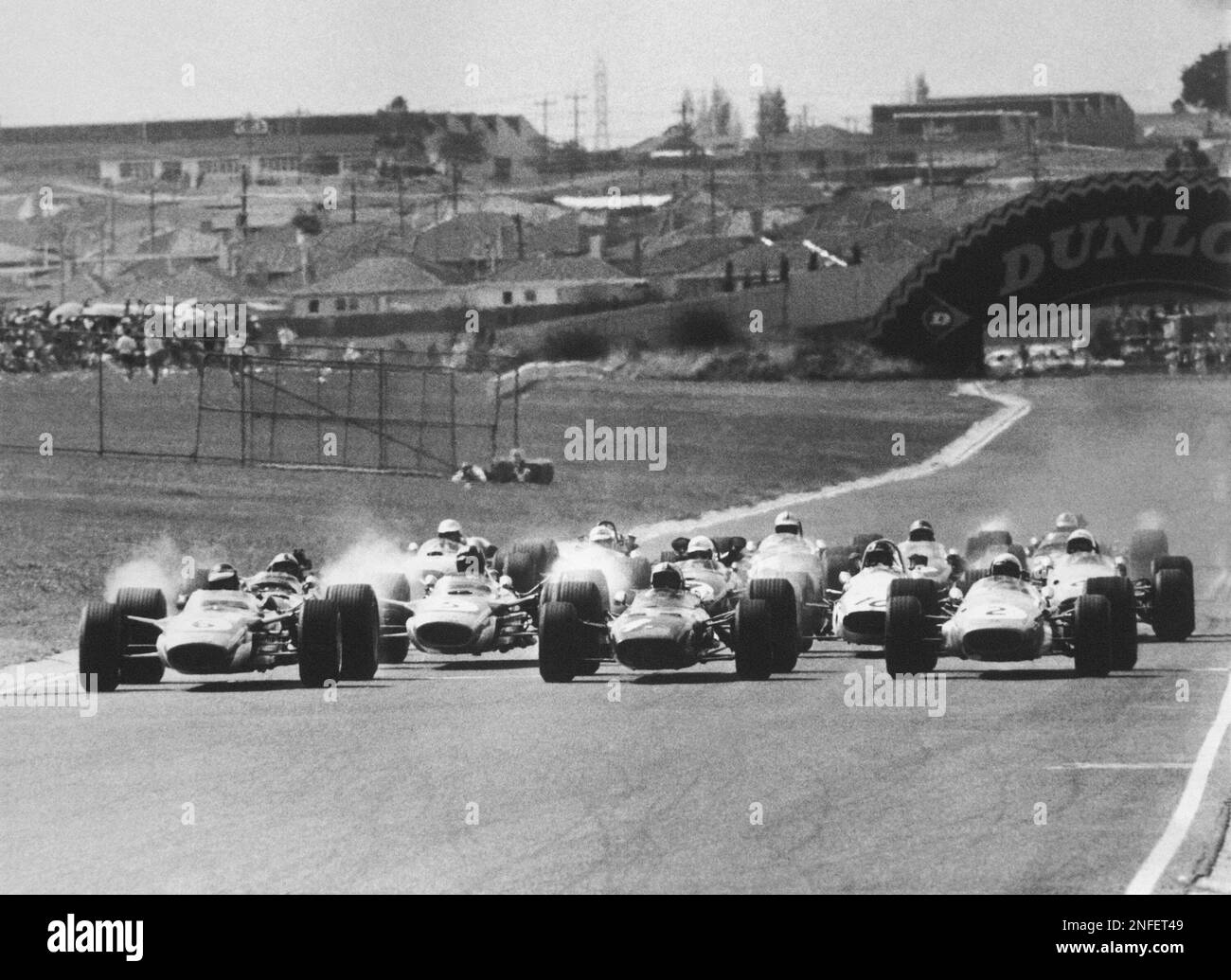 Drivers wait in their racing cars for the starter to signal the ...