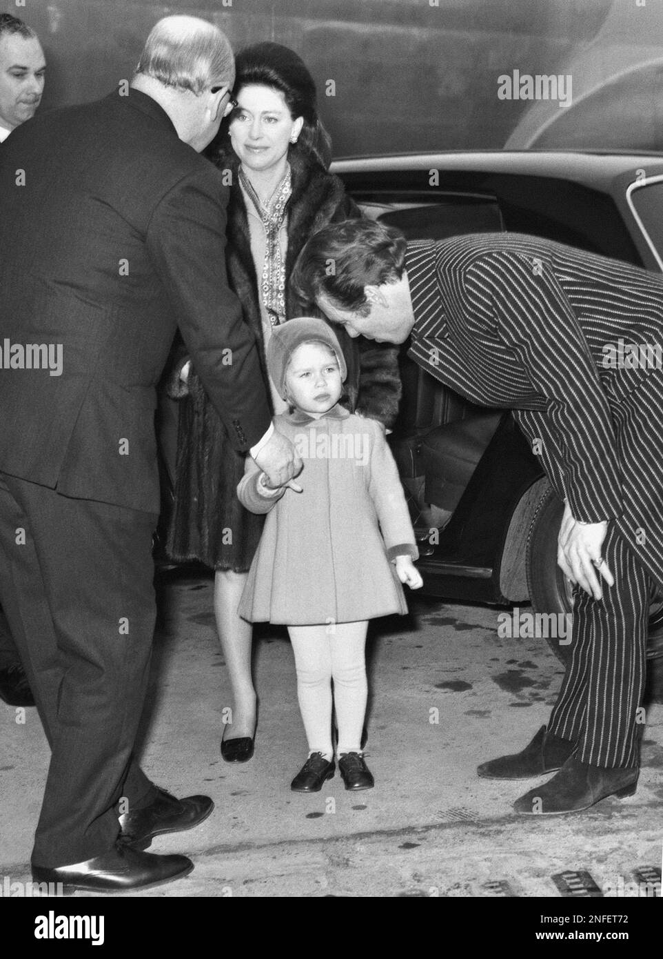 Britain's Princess Margaret talks to an unidentified official, left ...