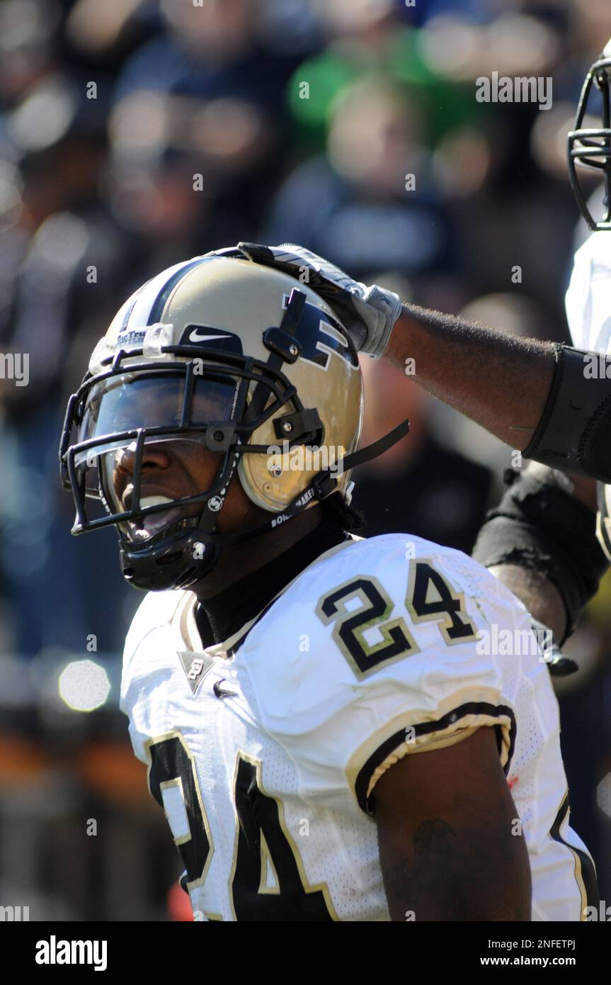 Purdue running back Kory Sheets celebrates his touchdown during action ...